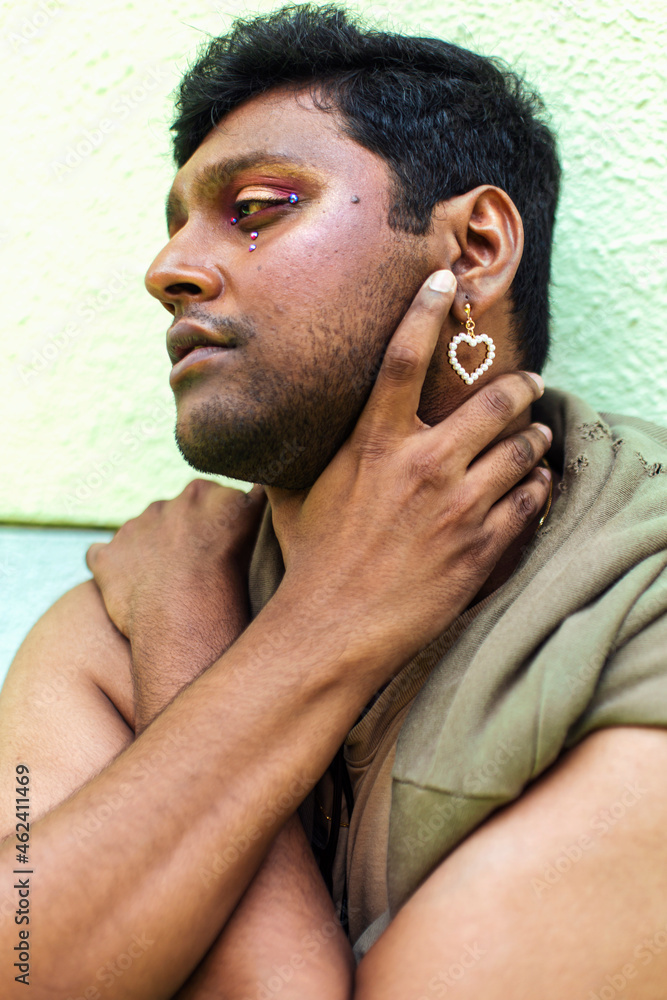 portrait of dark skinned Indian man in Malaysia, with theatrical facial ...