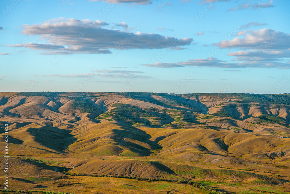Amazing sunset landscape of the valley with hills photographed from the ...