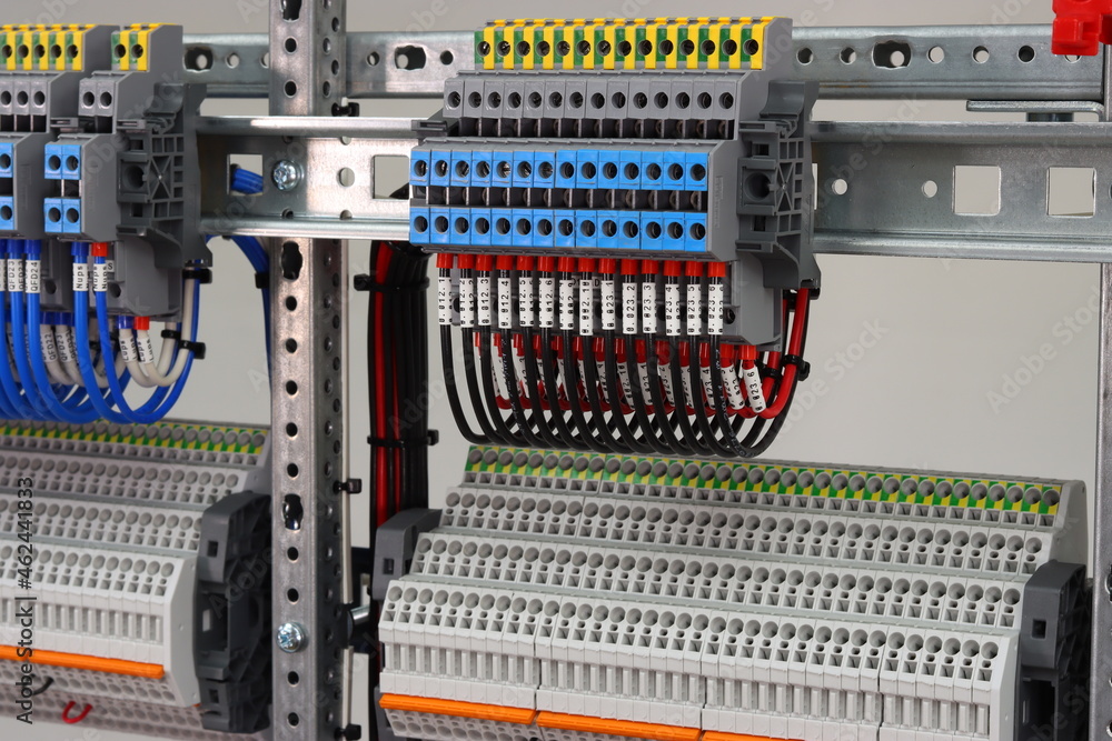 Multi-level pass-through terminals with installation on a din rail in ...