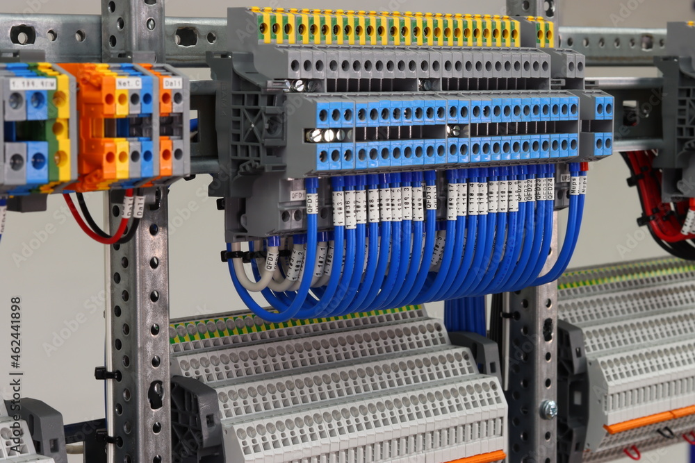 Multi-level pass-through terminals with installation on a din rail in ...