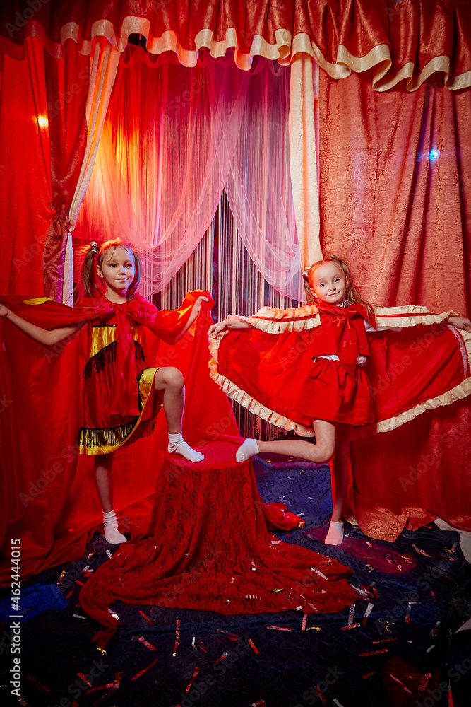 Small girls during a stylized theatrical circus photo shoot in a ...