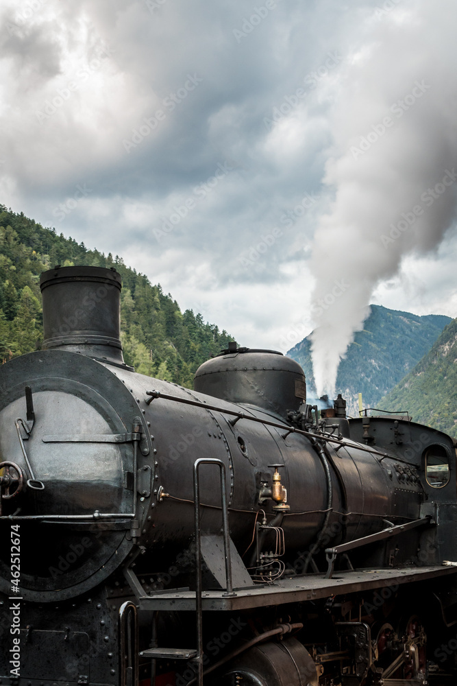 Old fashioned train vagon and Steam locomotive in the station of ...