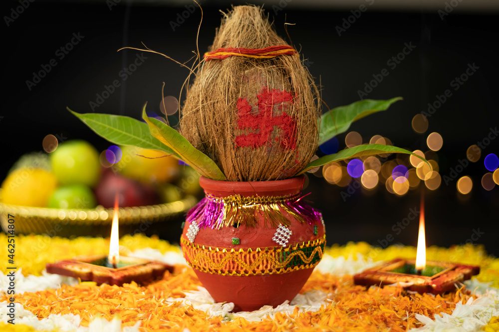 Terracotta Clay Kalash Decorated With Coconut, Mango Leaf Placed On ...