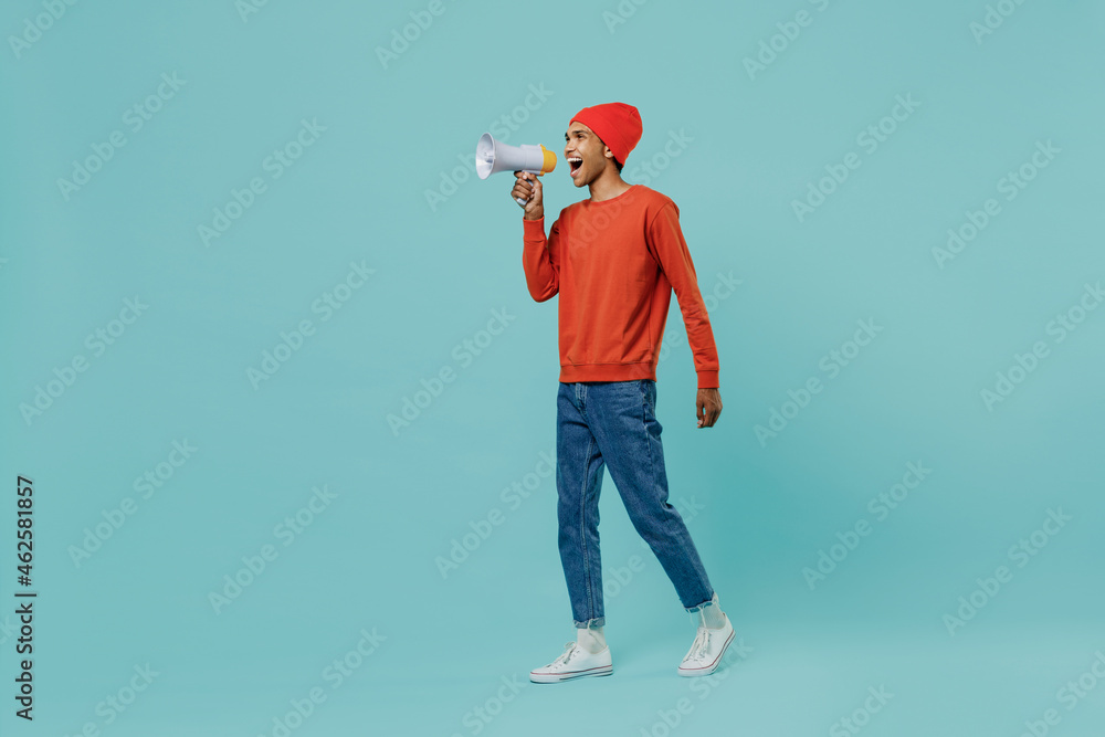 Full body young happy promoter african american man 20s in orange shirt ...