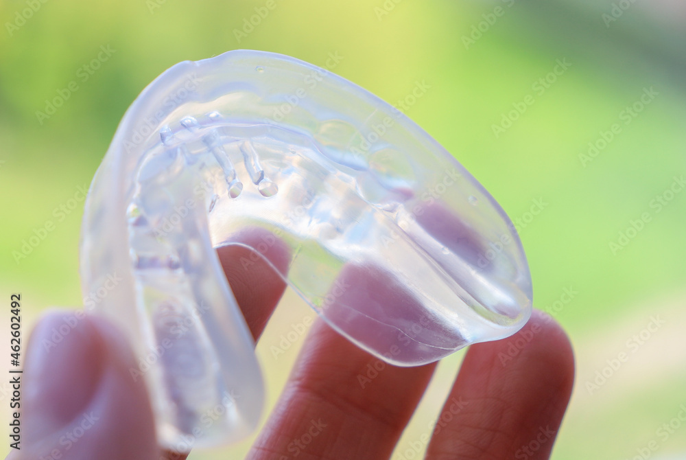 transparent mouth guard made of silicone, for straightening teeth in ...