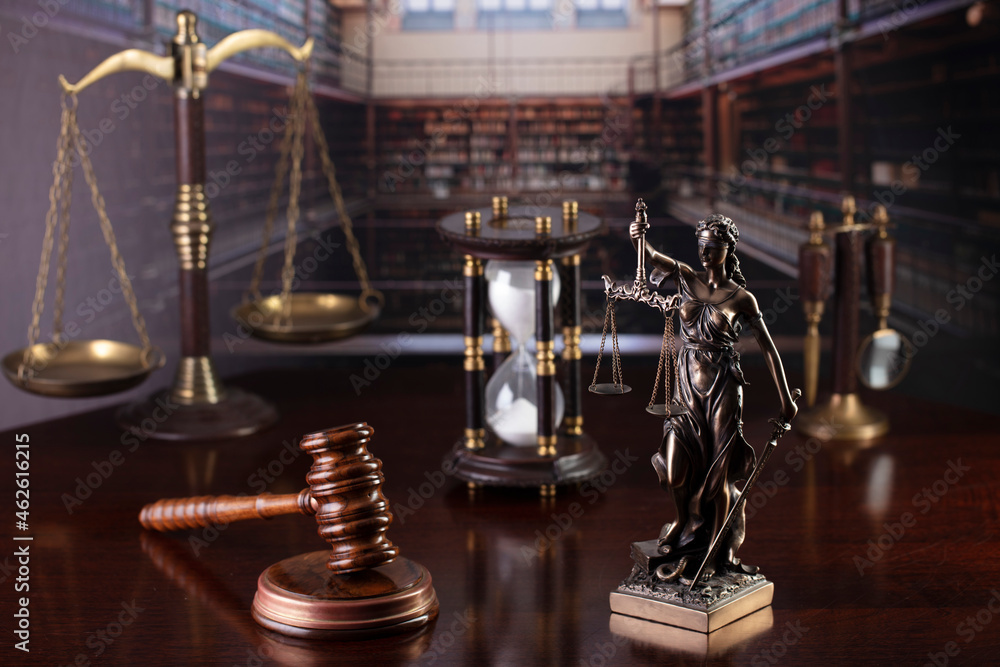 Law theme. Court library - gavel of the judge, Themis sculpture, scale ...