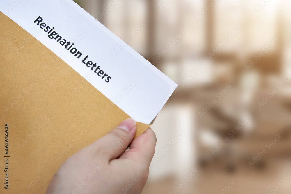Resignation letter. Resignation letter in brown envelope. concept of ...