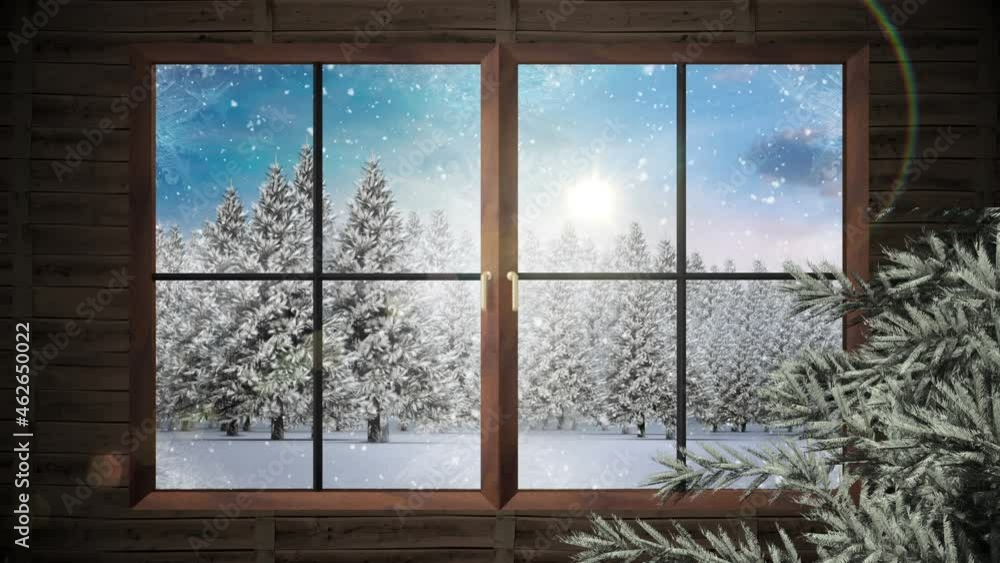Wooden window frame and tree branch against snow falling over multiple ...