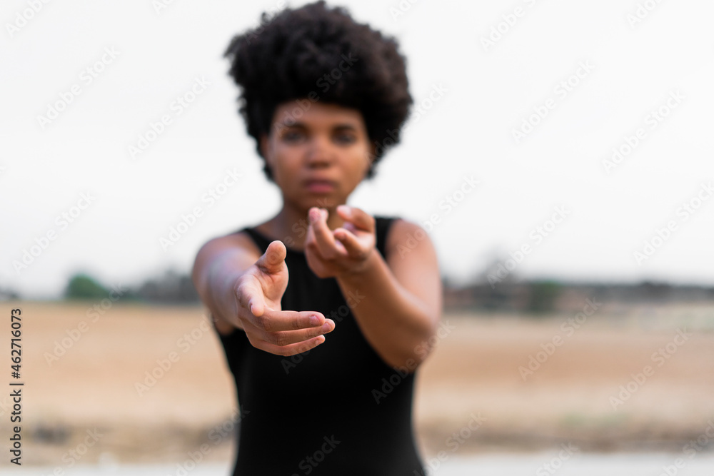 Woman's hands reaching out for help, pointing on viewer Stock Photo ...