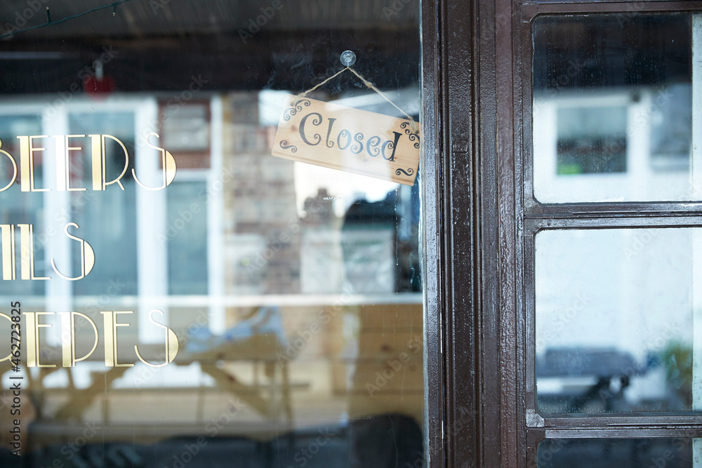 UK, England, London, Closed sign hanging behind shiny window Stock ...