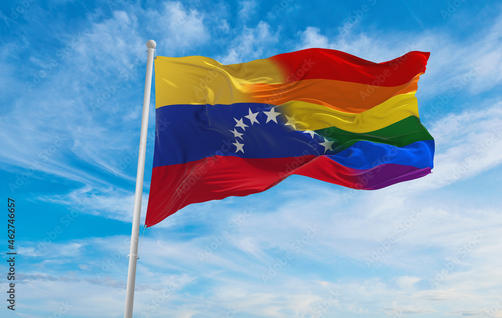 national lgbt flag of Venezuela flag waving in the wind at cloudy sky ...