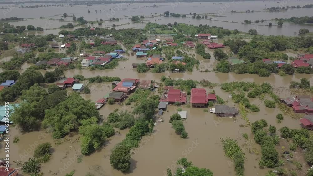 Drone flies over a small village in Thailand that has been flooded by ...