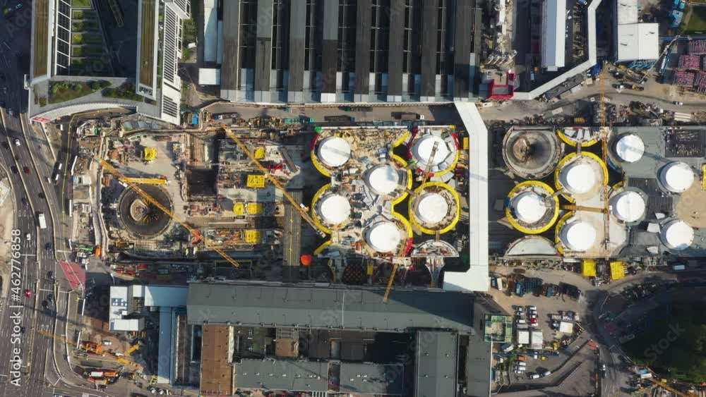 Aerial top down view of huge construction site of main train station ...