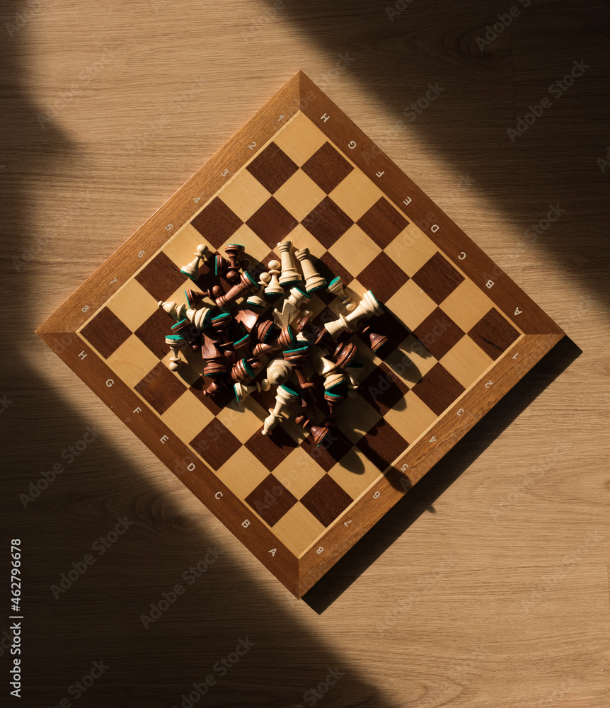 Chess pieces on chess board, top view Stock Photo | Adobe Stock