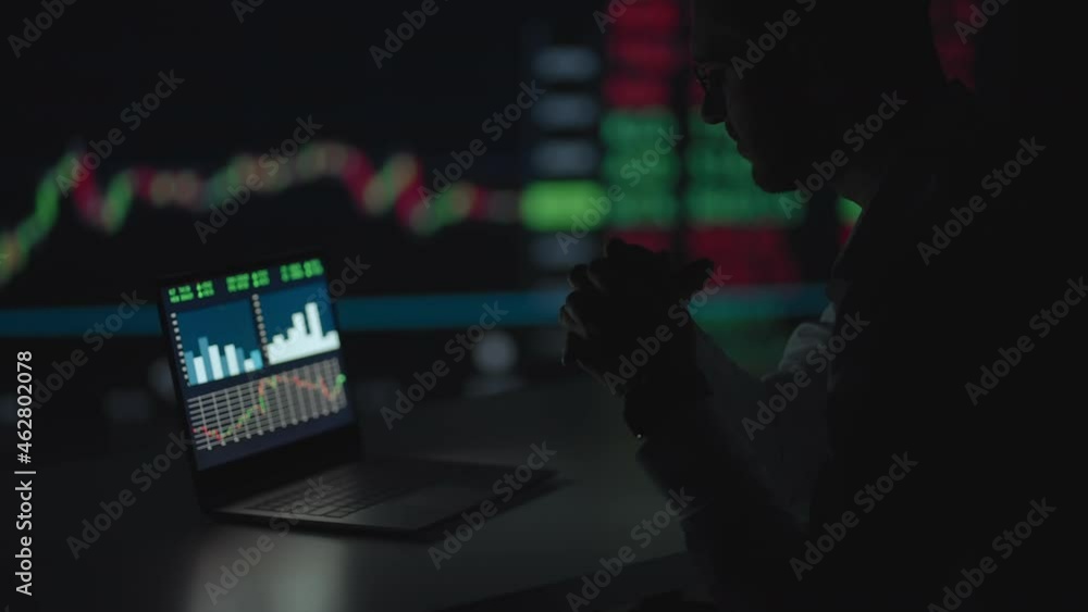 Late at Night in Private Office Businessman Works on a Laptop. Late at ...