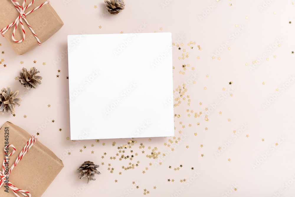 Christmas. Blank square paper mockup, golden stars confetti, bumps ...