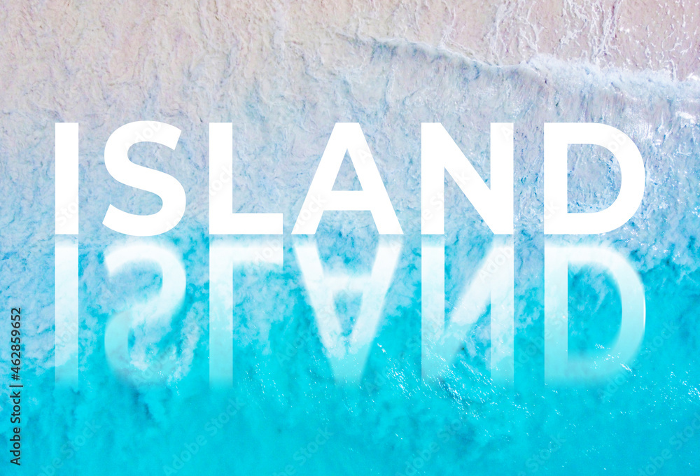 The word ISLAND written by the ocean with a wave on the beach ...