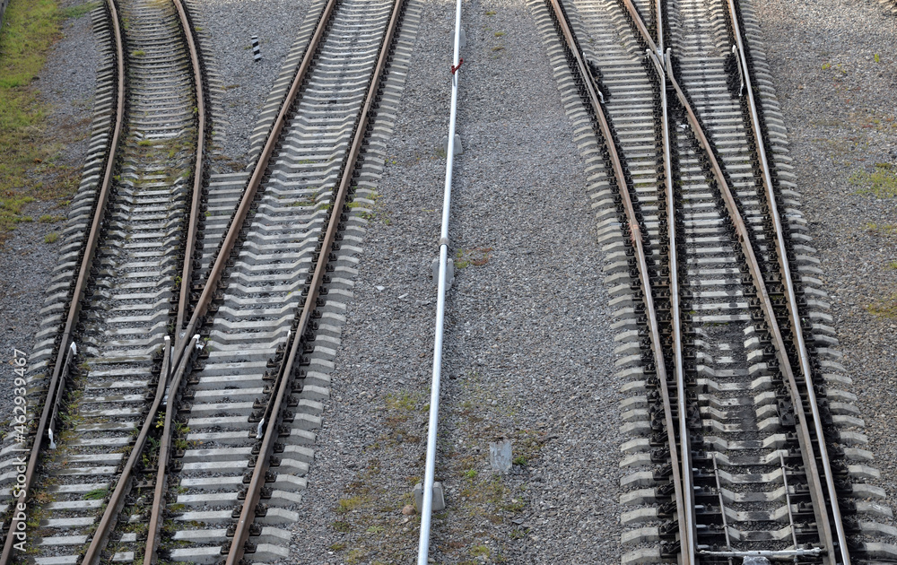Four intersecting railway lines on gravel Stock Photo | Adobe Stock