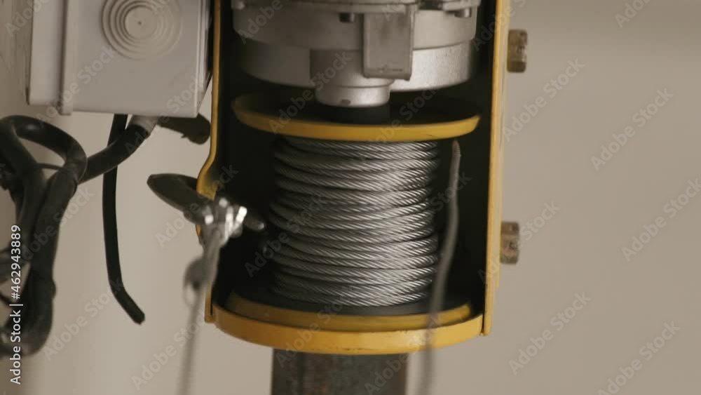 steel cable is wound on the winch spool. High quality FullHD footage ...