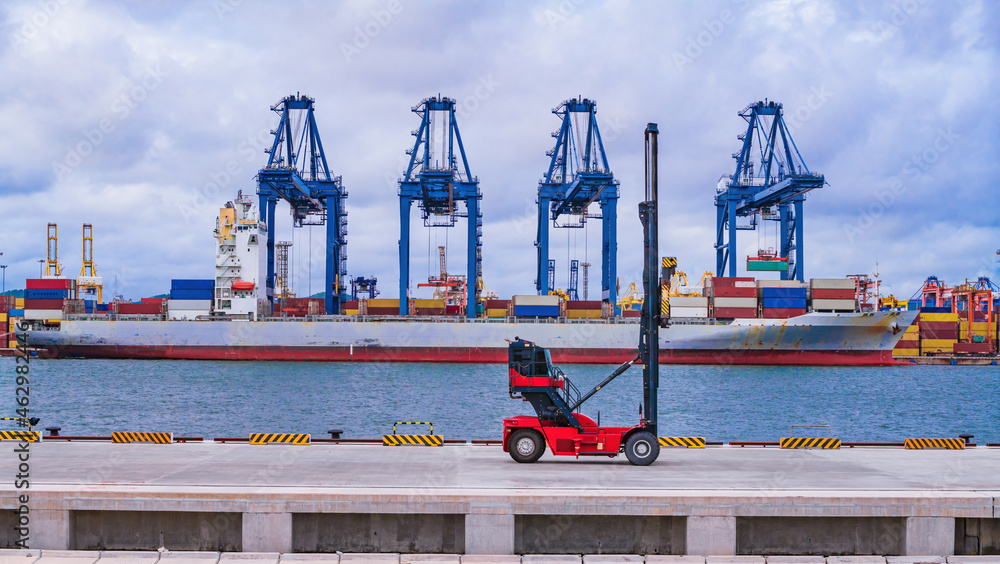Cargo ship parking at seaport waiting for container dock crane shipment ...