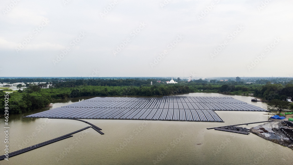 Solar panels on water in aerial view, rows array of polycrystalline ...