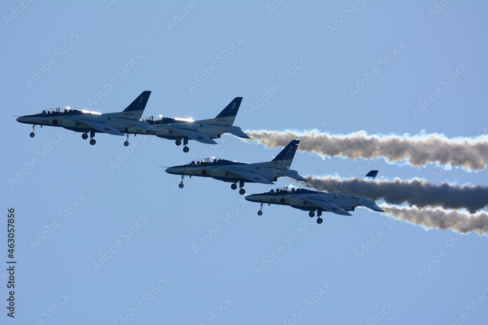 JASDF aerobatic team Blue Impulse flying in deep blue sky Stock Photo ...