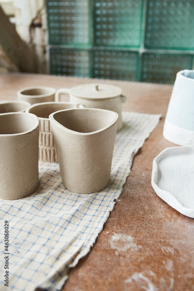 Working table of a ceramist. Clay workshop. The process of creating ...