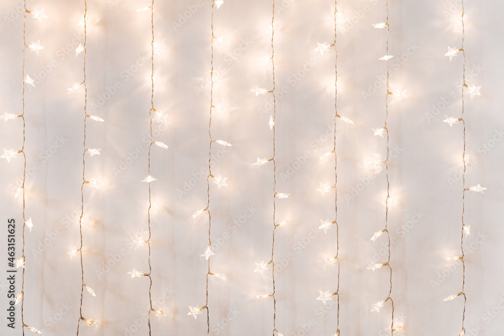 Twinkle lights background on a wall Stock Photo | Adobe Stock