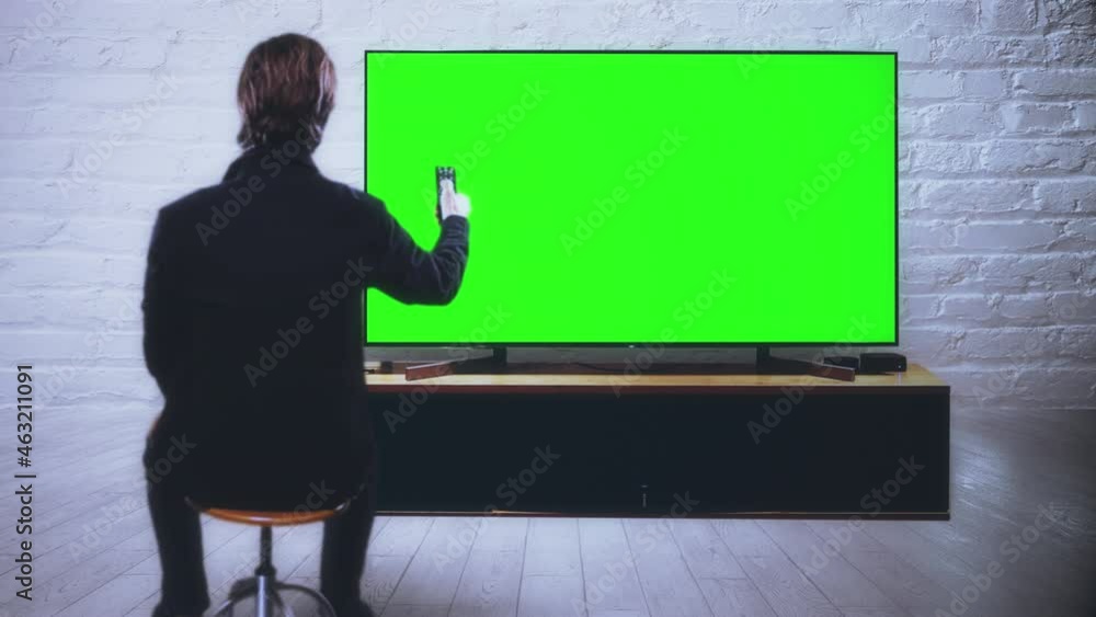 Changing Channels Green Screen Television Man Sitting at Home Using TV ...
