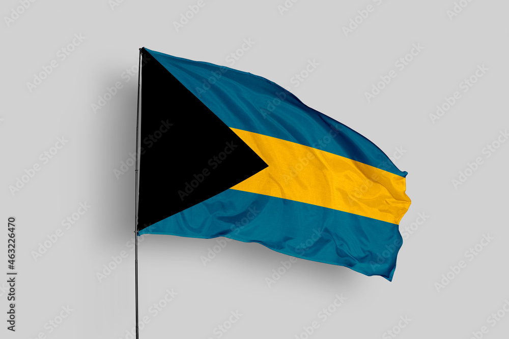 Bahamas flag isolated on the blue sky background. close up waving flag ...