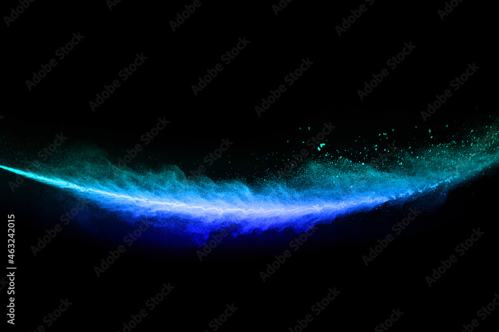 abstract blue powder splatted background,Freeze motion of color powder ...
