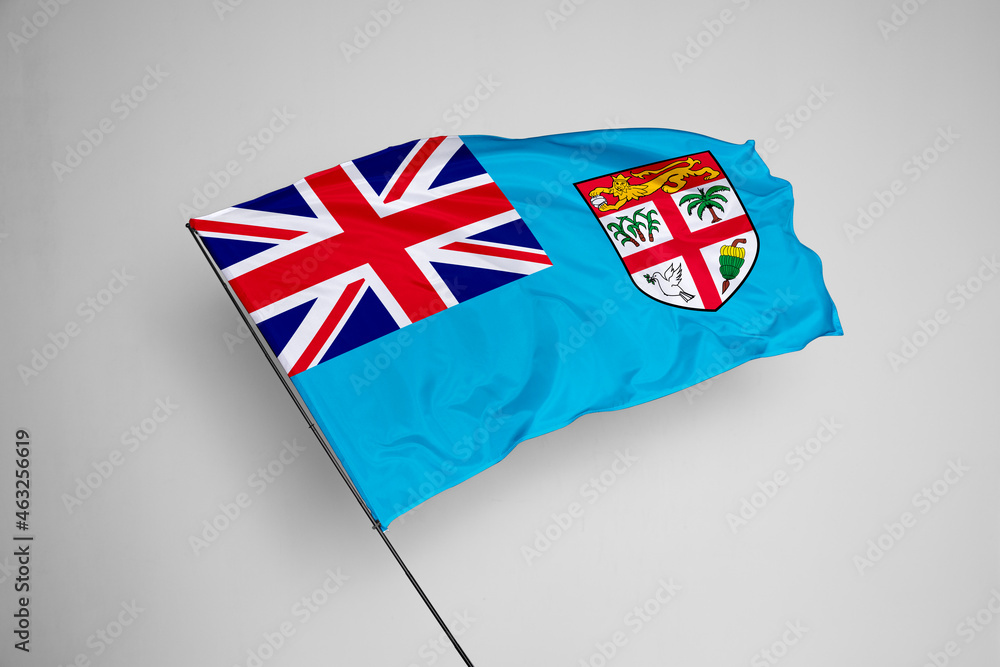 Fiji flag isolated on white background. close up waving flag of Fiji ...