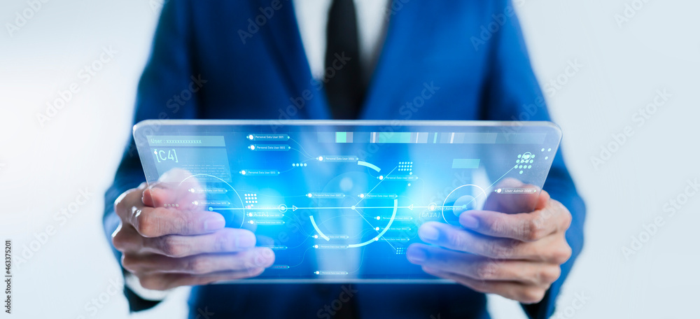 Business man hand on computer viewing company corporate management data ...