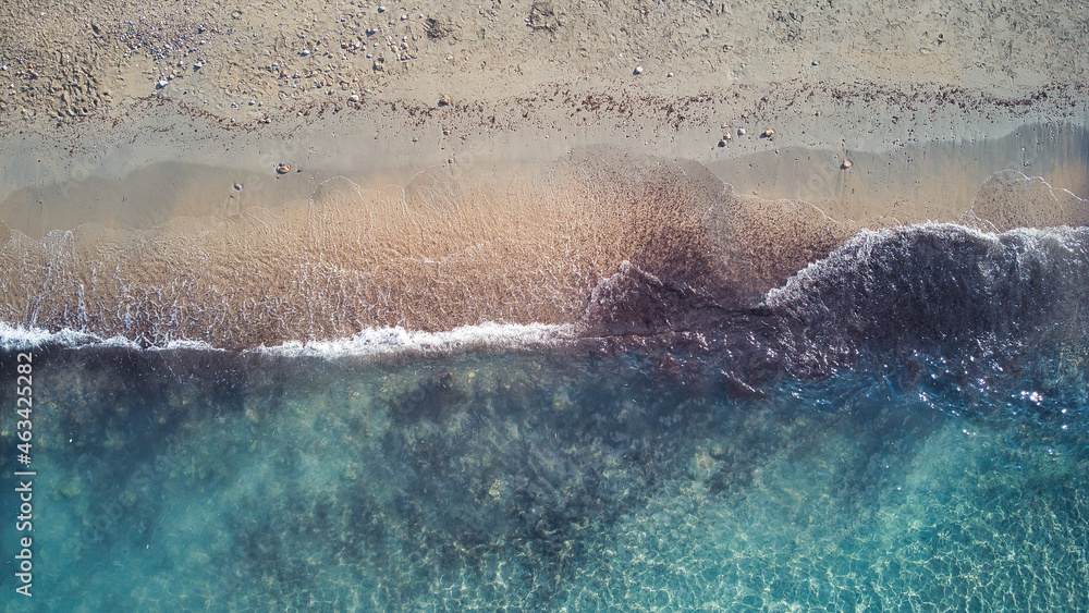 Beautiful birdsview with a drone on the beach, sand, sea and waves ...