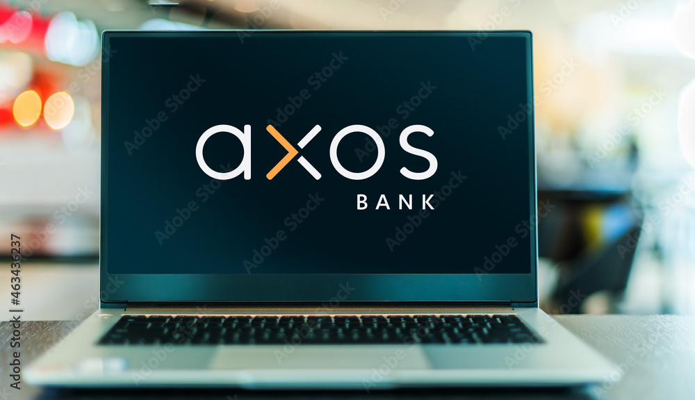 Laptop computer displaying logo of Axos Bank Stock Photo | Adobe Stock