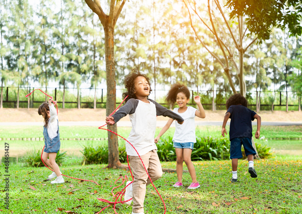 Group of diversity kids playing cheerful in the park. Children having ...