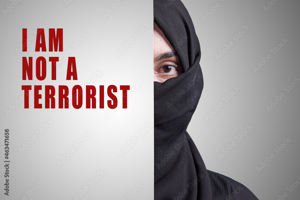 I am not a terrorist. Muslim girl in traditional nikab clothing Stock ...