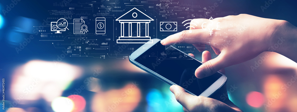 Online banking concept with blurred city lights at night Stock Photo ...