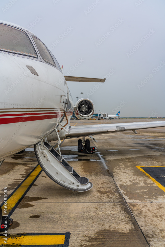 luxury private jet - front view, the onboard stairs is already extended ...