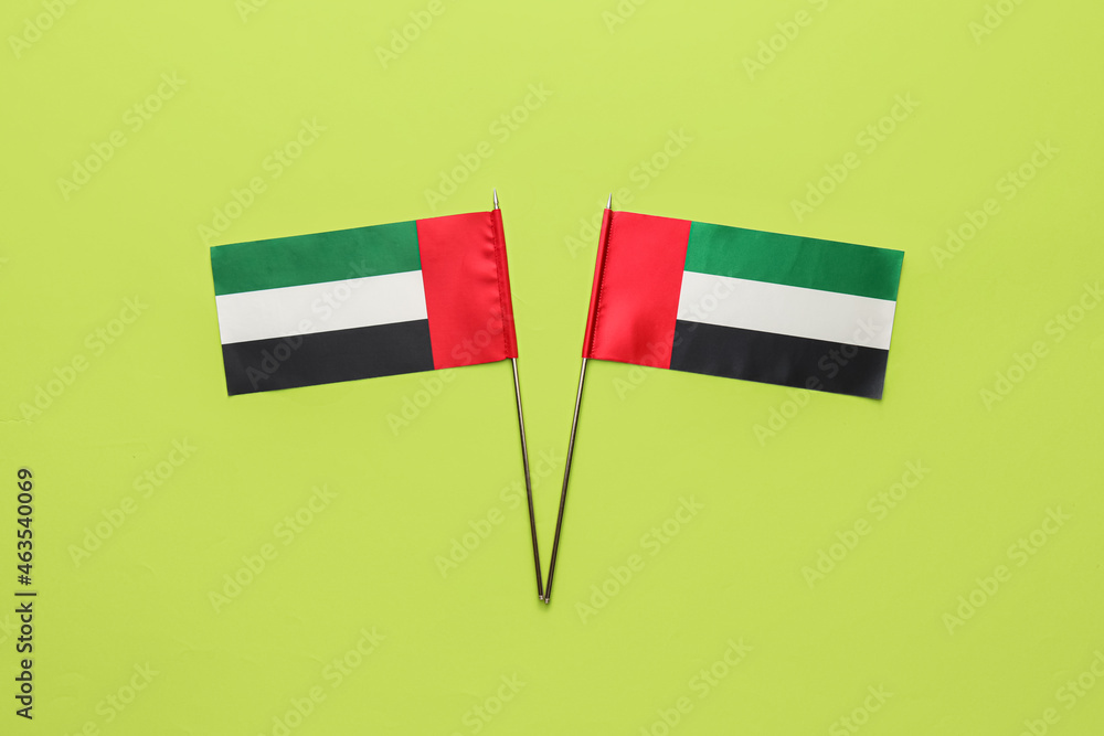 National United Arab Emirates flags on green background Stock Photo ...