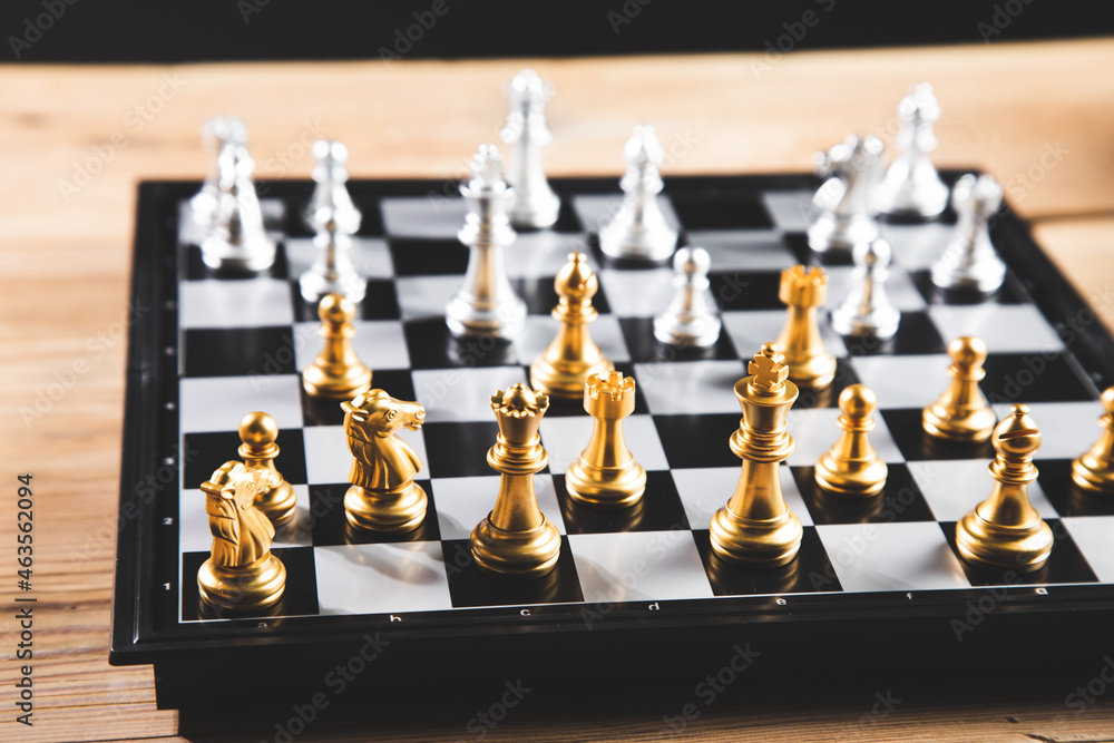 gold and silver chess pieces Stock Photo | Adobe Stock
