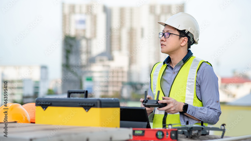 Asian engineer man working with drone, laptop and working tools at ...