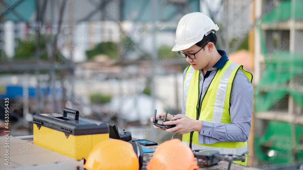 Asian engineer man working with drone, laptop and working tools at ...