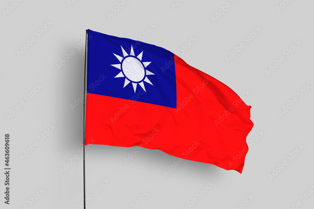 Taiwan flag isolated on the blue sky background. close up waving flag ...