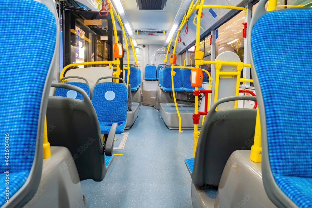 interior of bus. Modern public transport. Bus with blue seats. Yellow ...