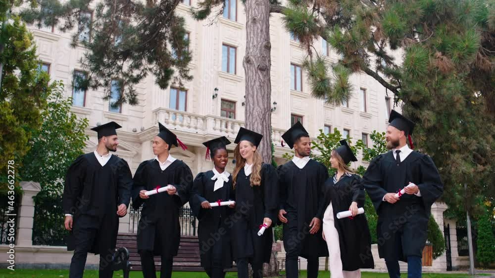 Group of charismatic and beautiful students multiracial graduates in ...