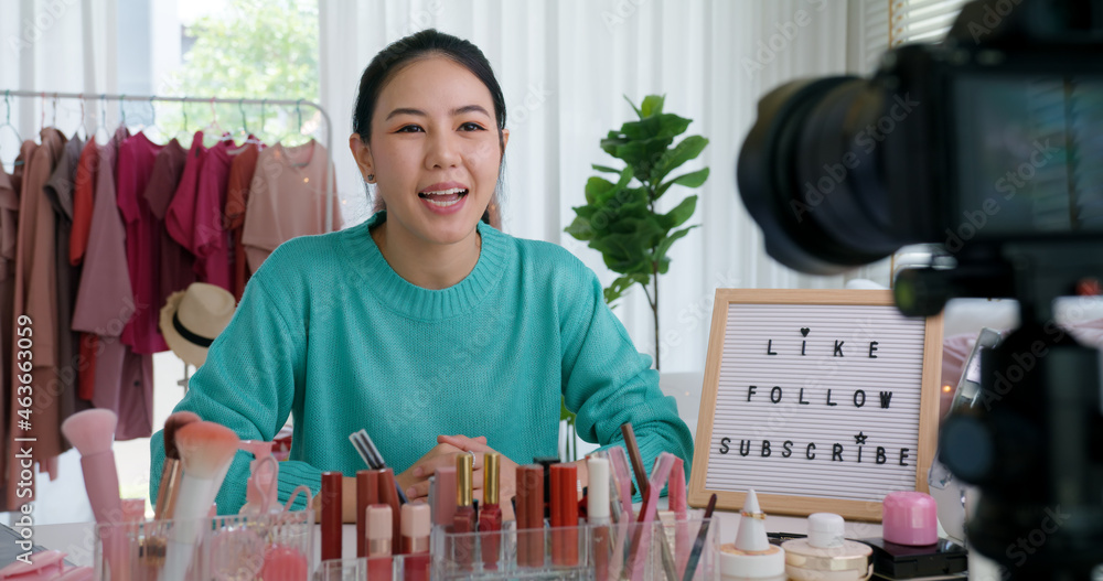 Asia woman micro influencer record live viral video camera at home ...