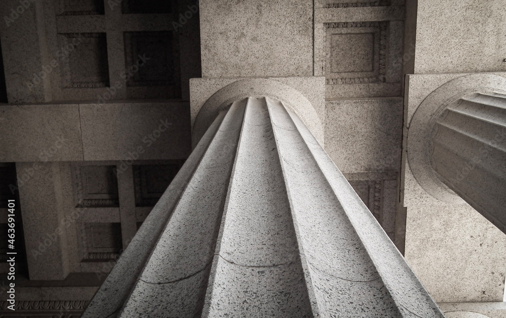 Tall rough stone pillar rises high in history landmark temple monument ...