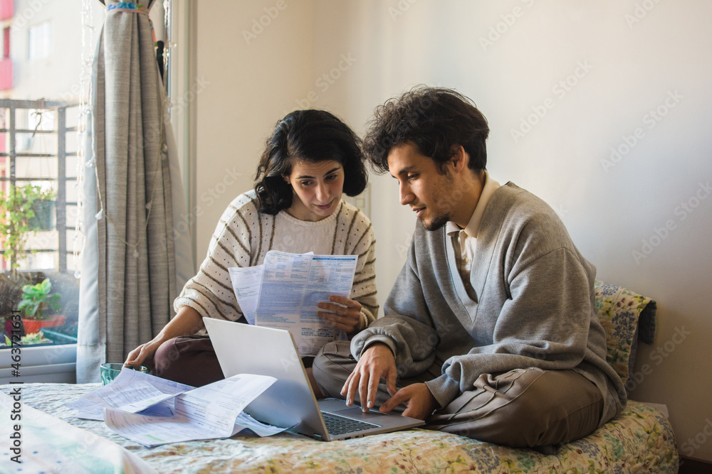 Couple working on their personal finance Stock Photo | Adobe Stock