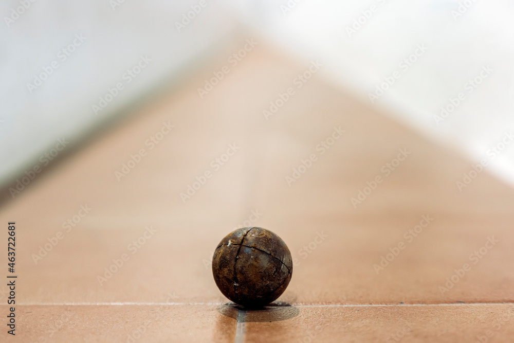 Extreme close up of a ball or "pelota" of a traditional spanish game ...